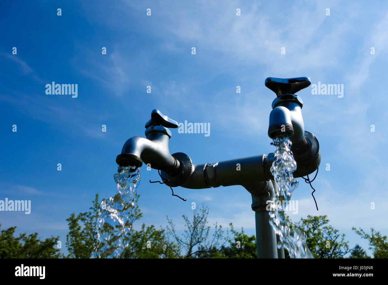 Leaving water running Stock Photo - Alamy
