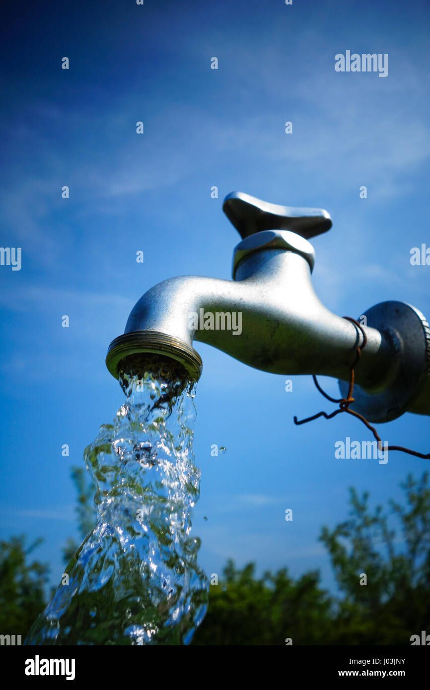 Leaving water running Stock Photo - Alamy