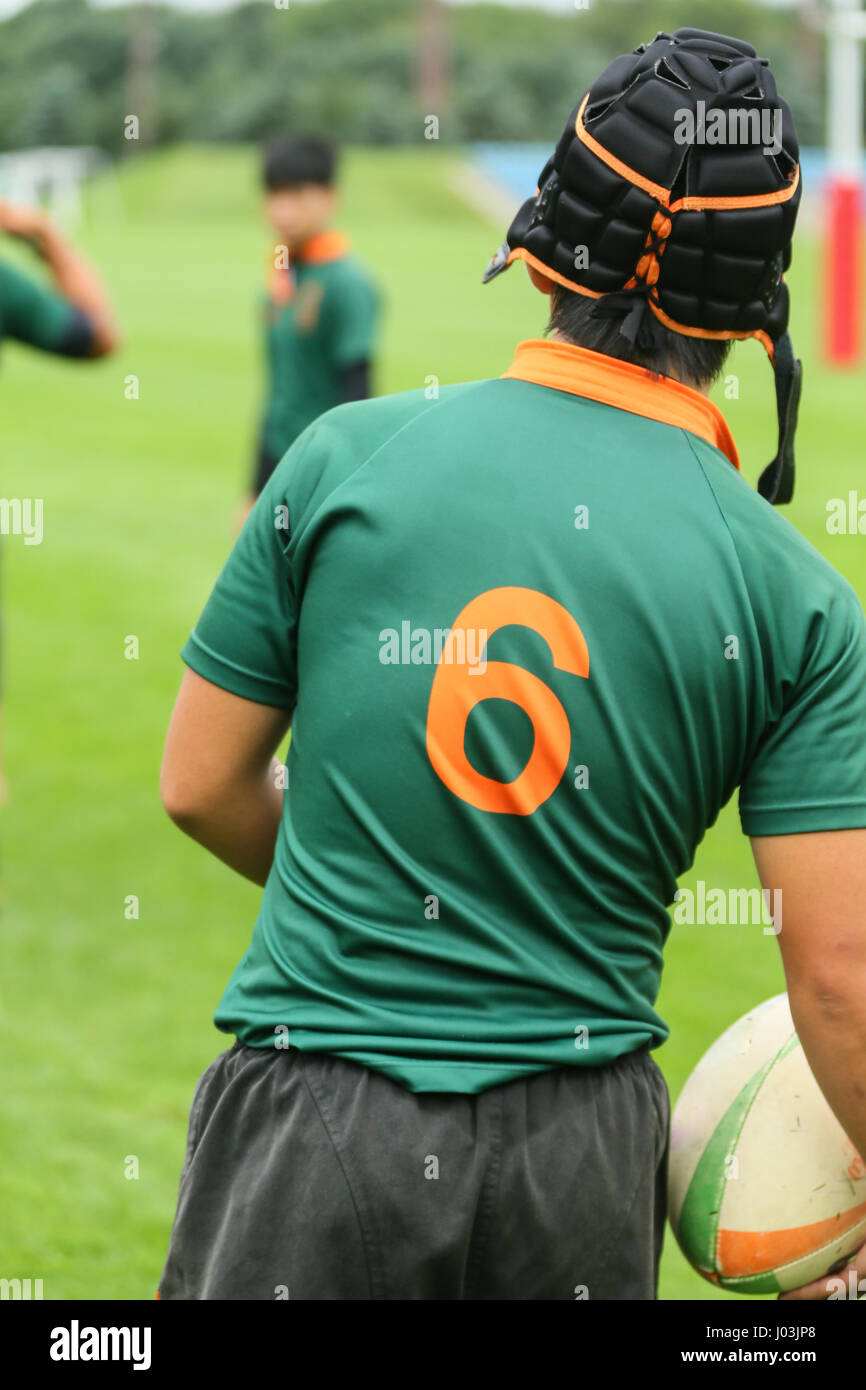Male student rugby ball hi-res stock photography and images - Alamy