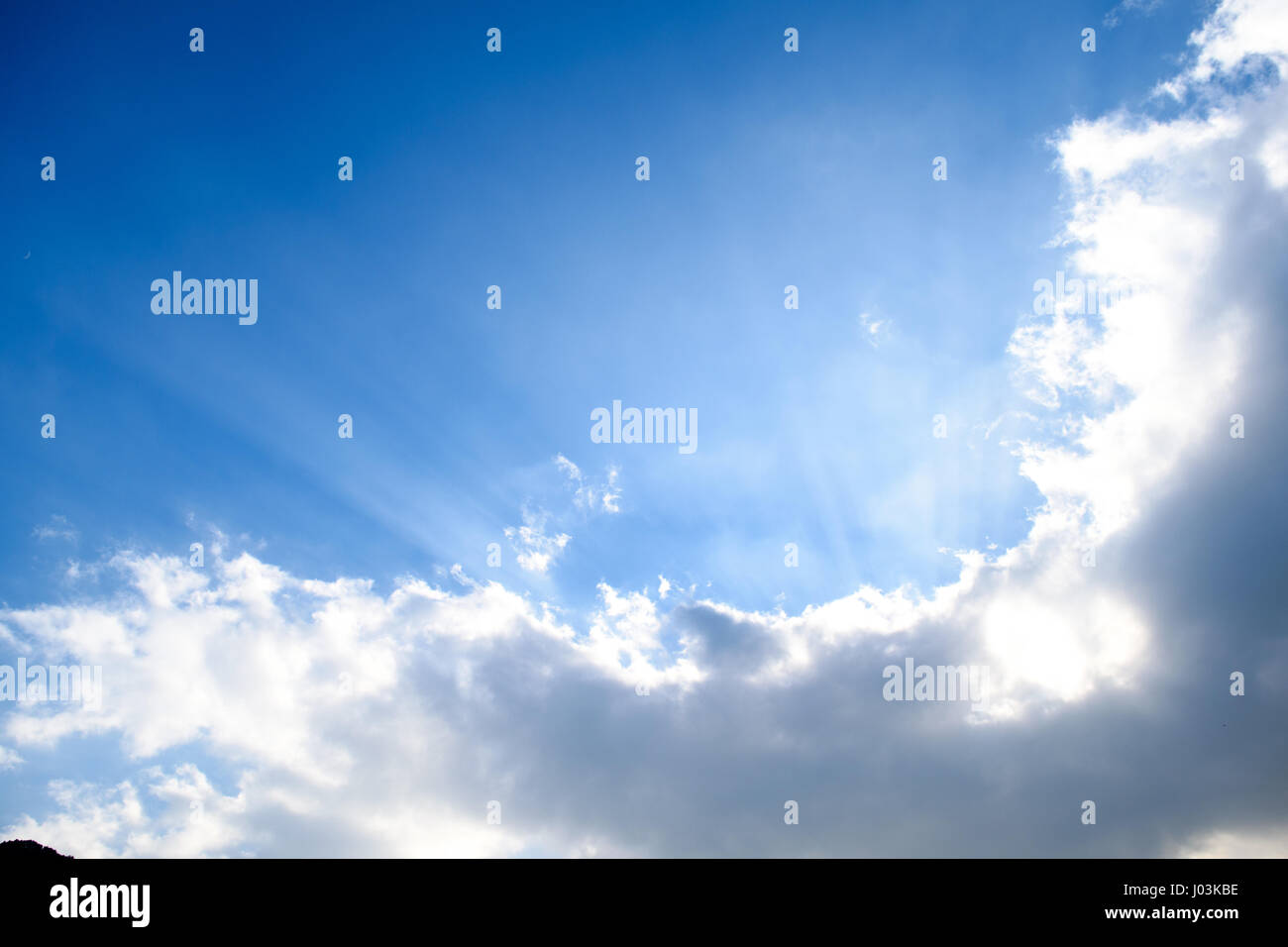 Blue sky and beam of light Stock Photo - Alamy