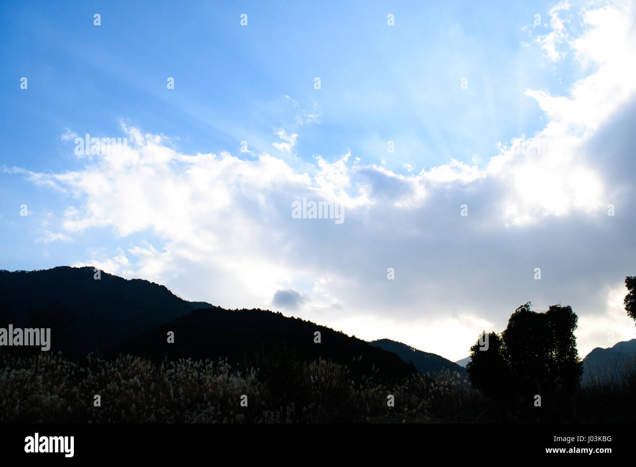 Blue sky and beam of light Stock Photo - Alamy