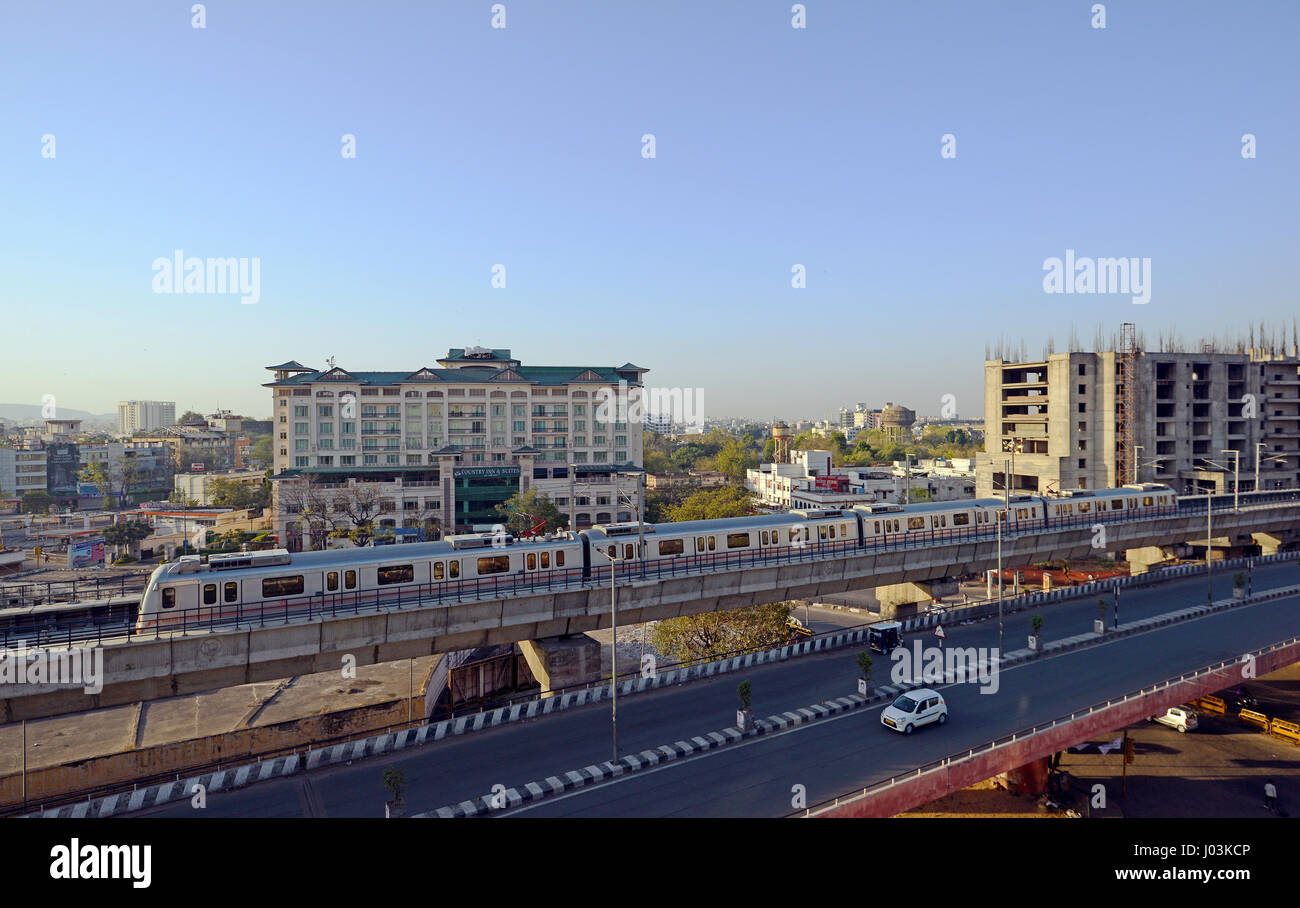 Metro train in city Stock Photo - Alamy