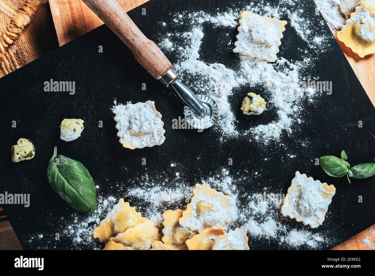 Ravioli , italian traditional stuffed pasta with herbs , ricotta cheese ...