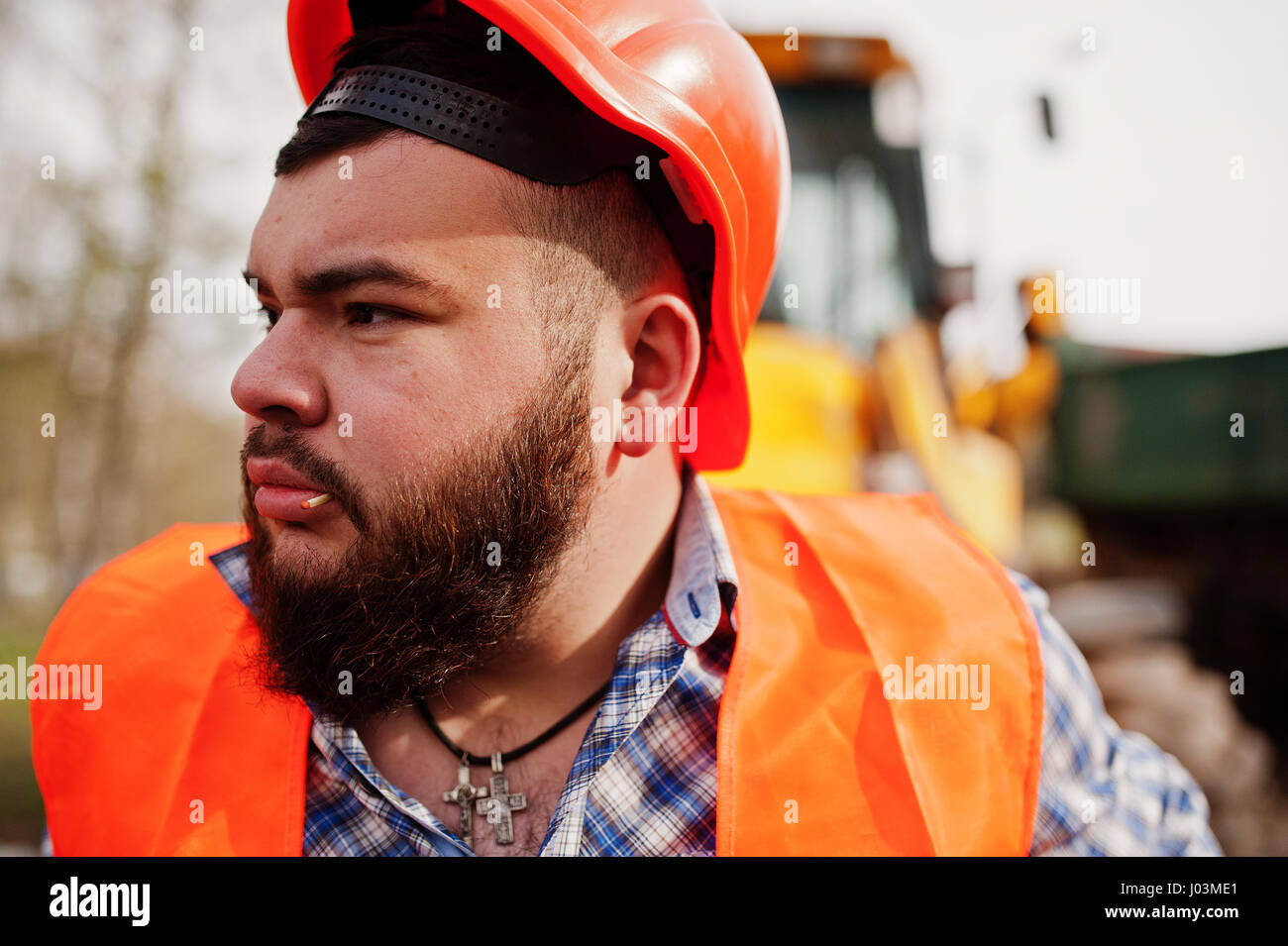 Close up portrait of brutal beard worker man suit construction worker ...
