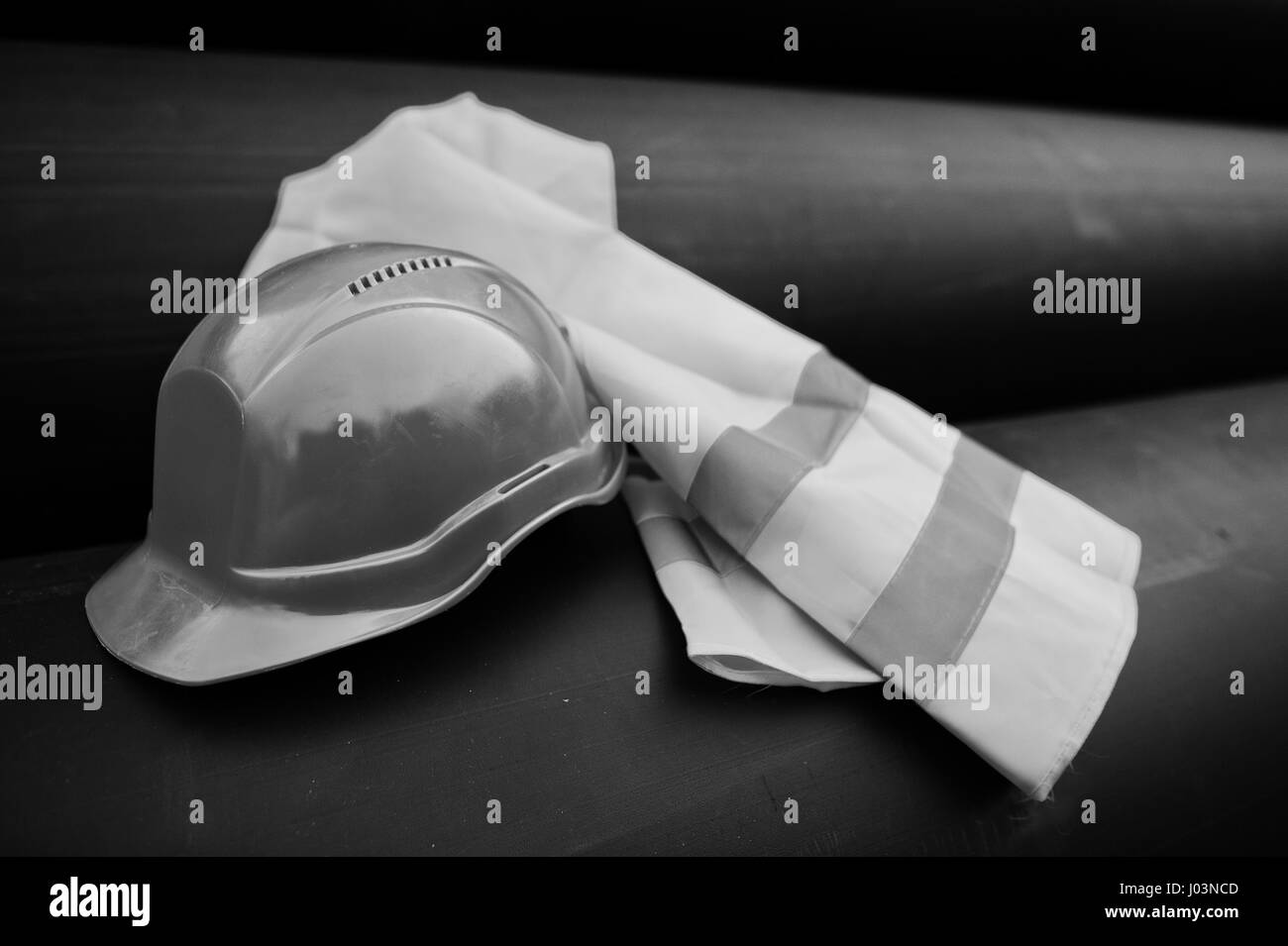 Safety helmet orange color Black and White Stock Photos & Images - Alamy