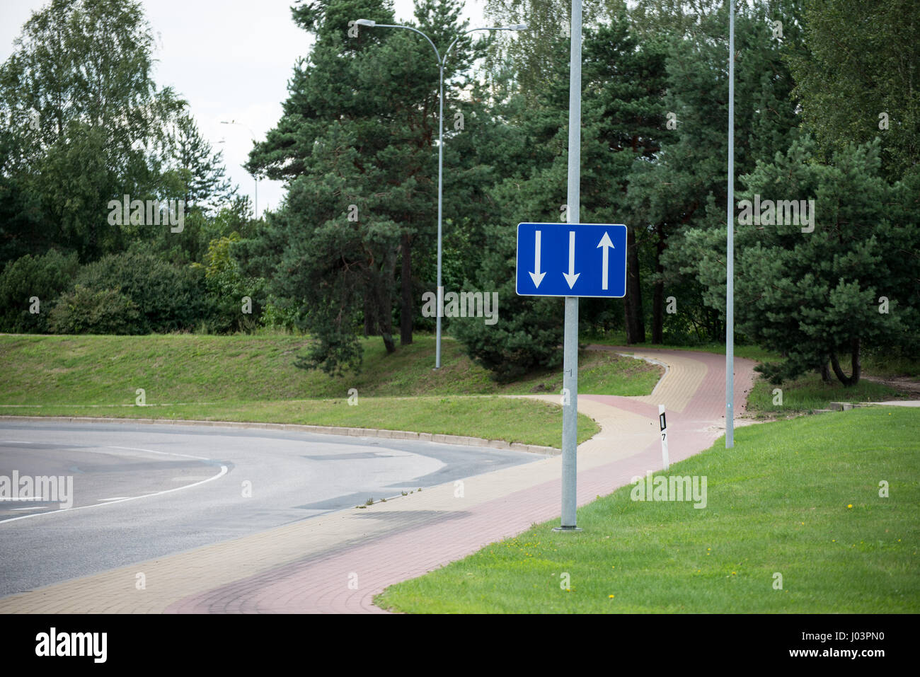 road signs and lines on asphalt Stock Photo - Alamy