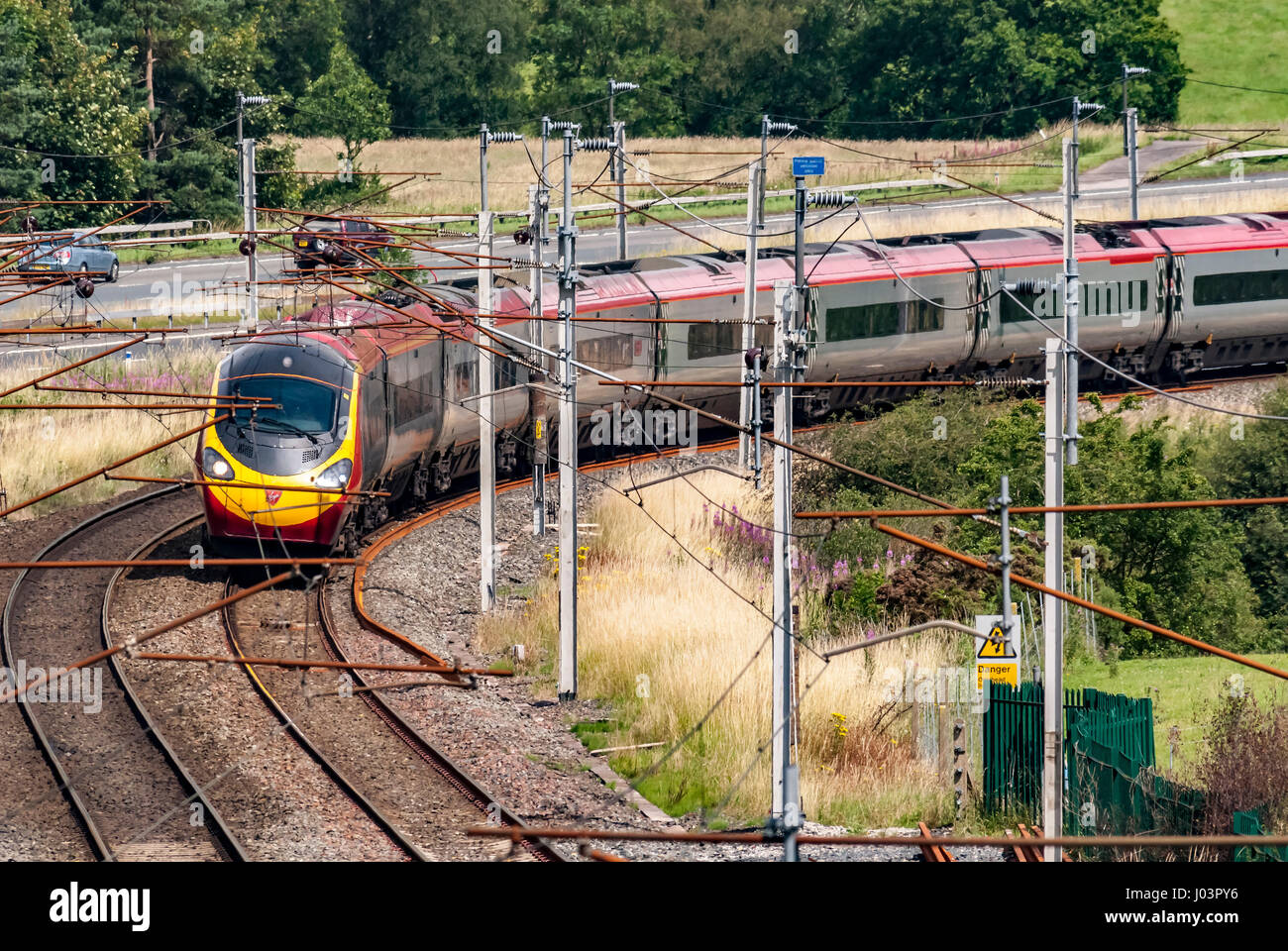 Virgin passenger train on the West Coast Main Line in Cumbria ...