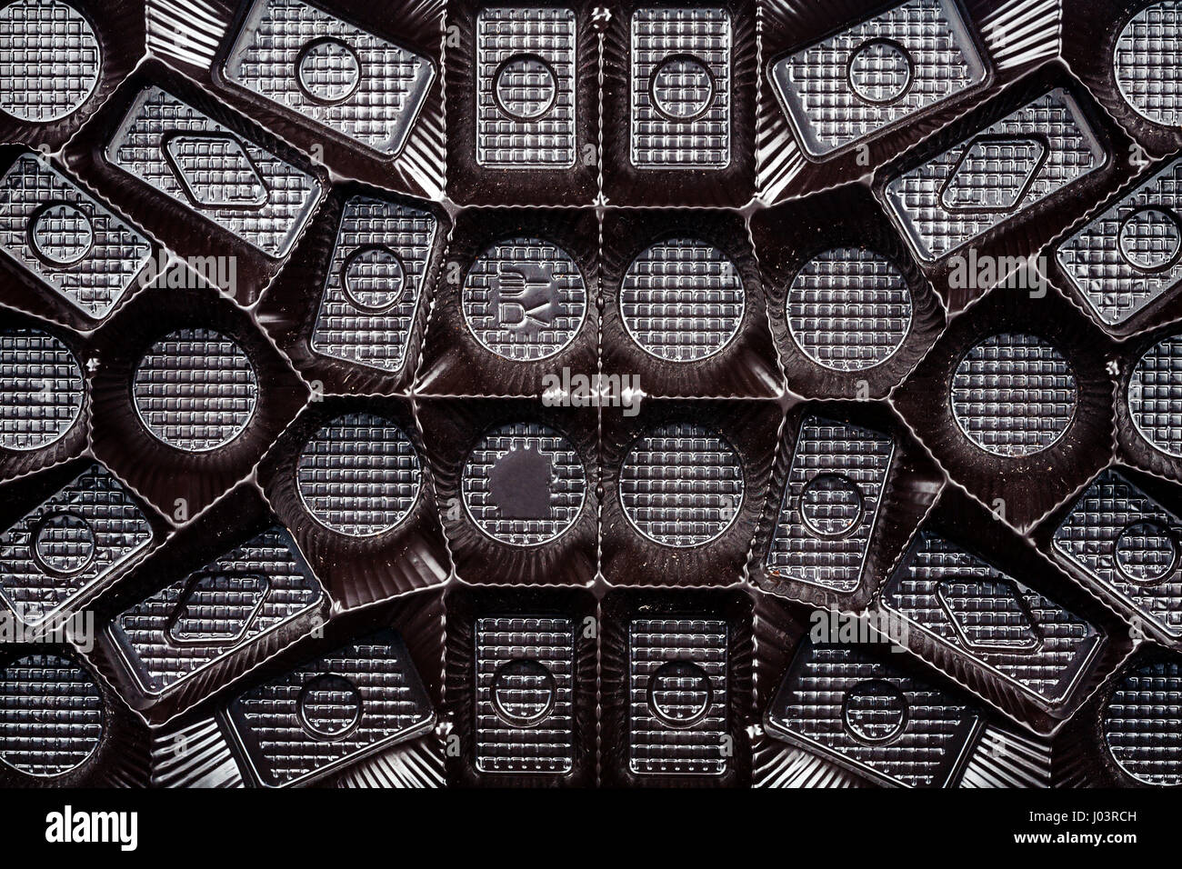 Close up shot of empty box of chocolates Stock Photo - Alamy