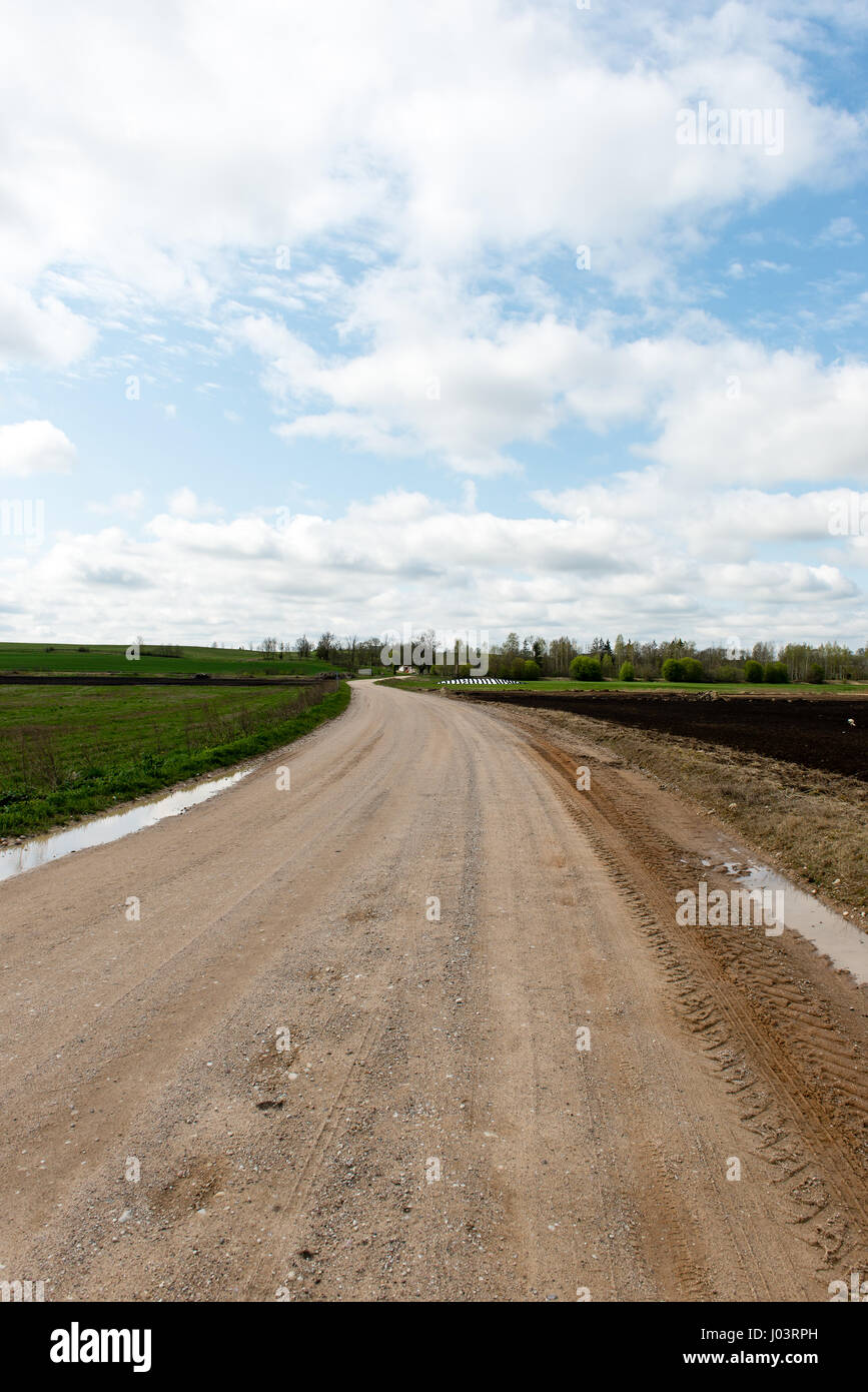 empty country road in spring with perspective and shadows Stock Photo ...