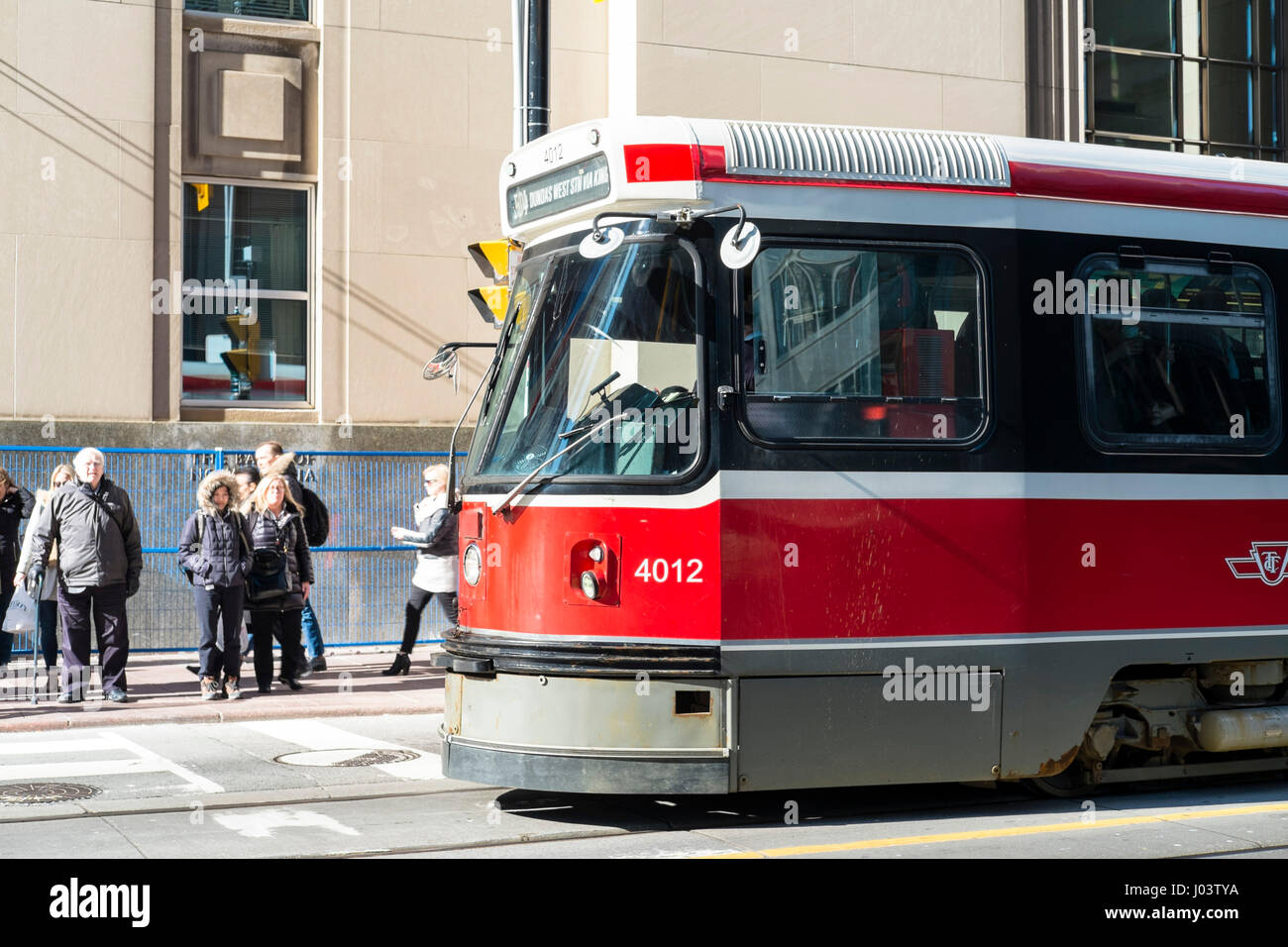 Tram passing the front of the Bank of Nova Scotia in the Financial ...