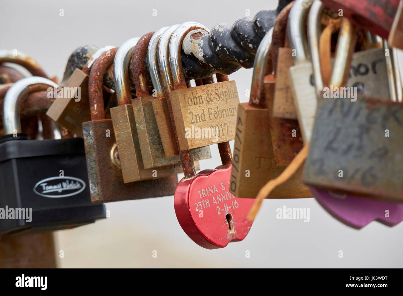 Fence with love locks hi-res stock photography and images - Alamy