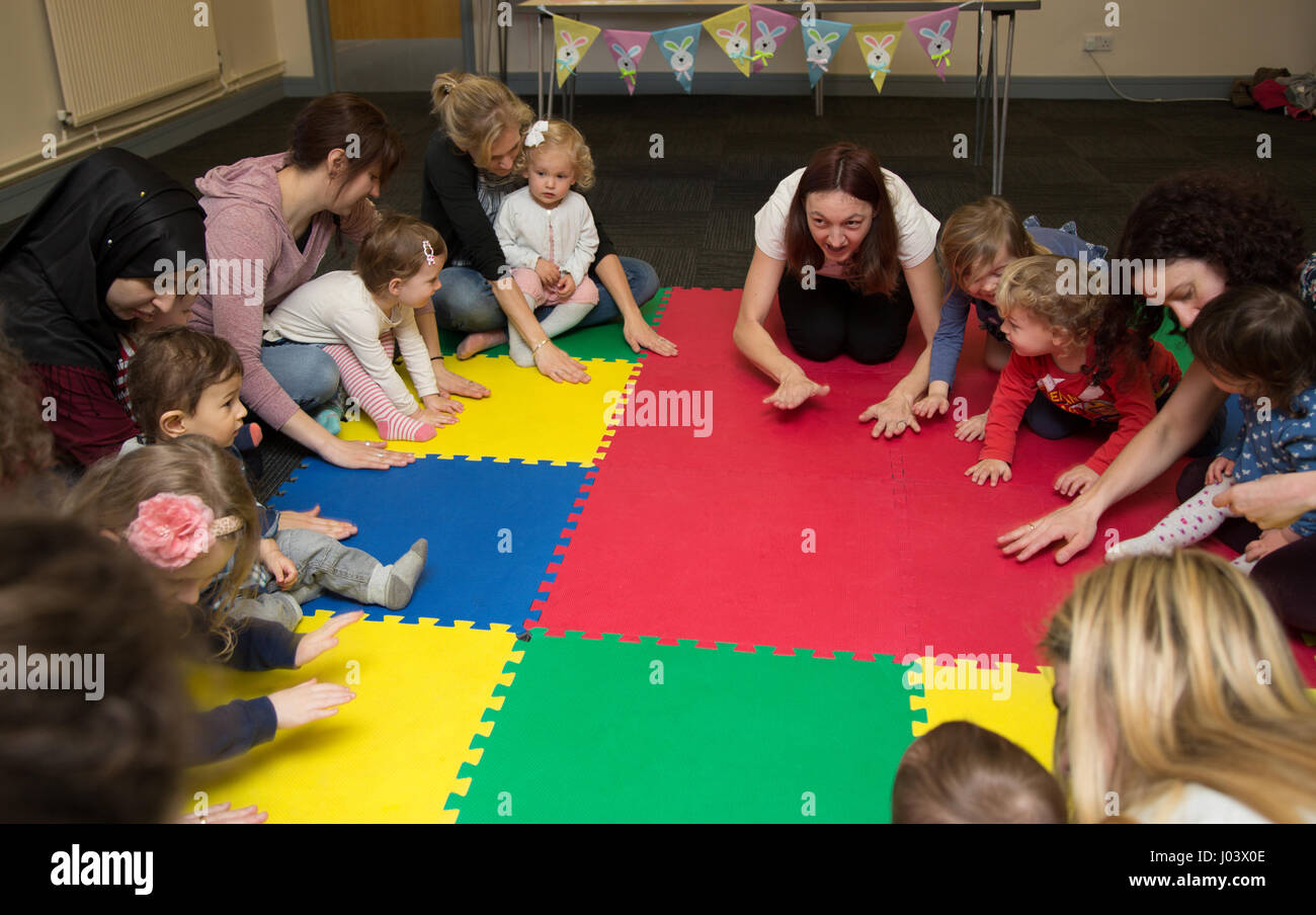 Group of children playing circle games hi-res stock photography and ...