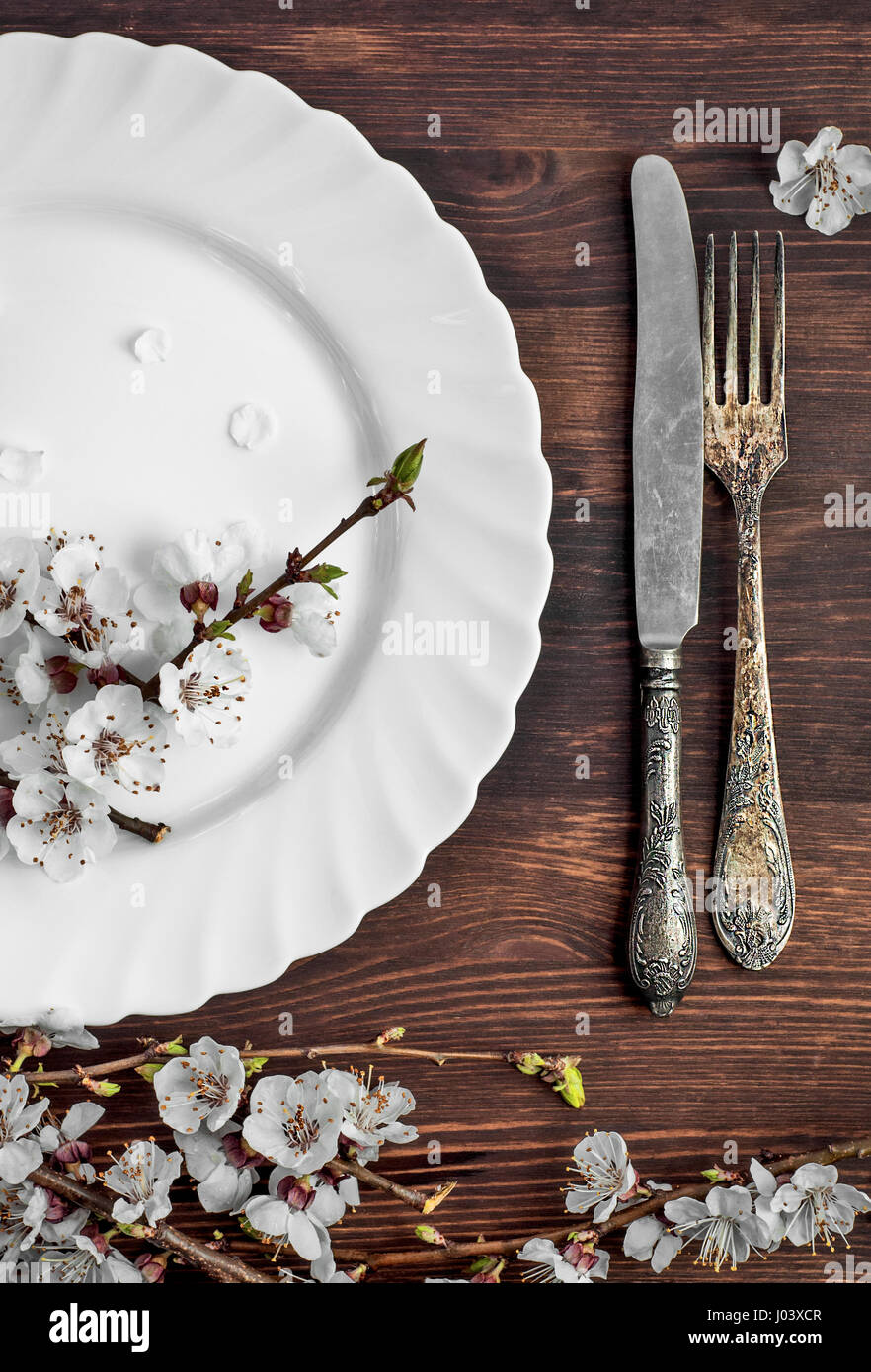 White empty plate and metal vintage knife and fork, top view Stock ...