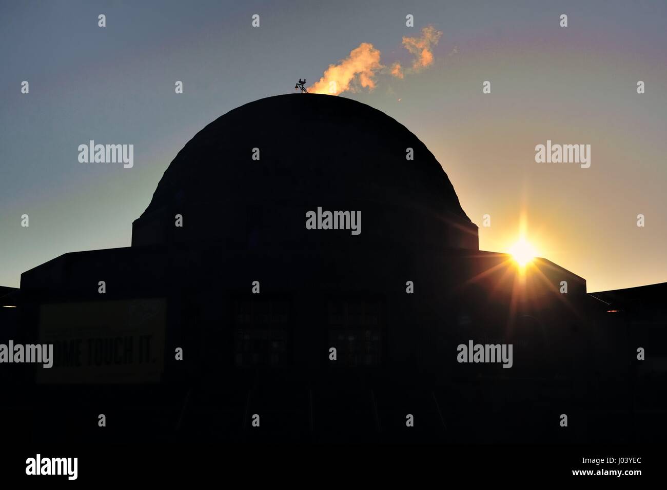 The Adler Planetarium as the rising sun breaks the roof line. Chicago ...