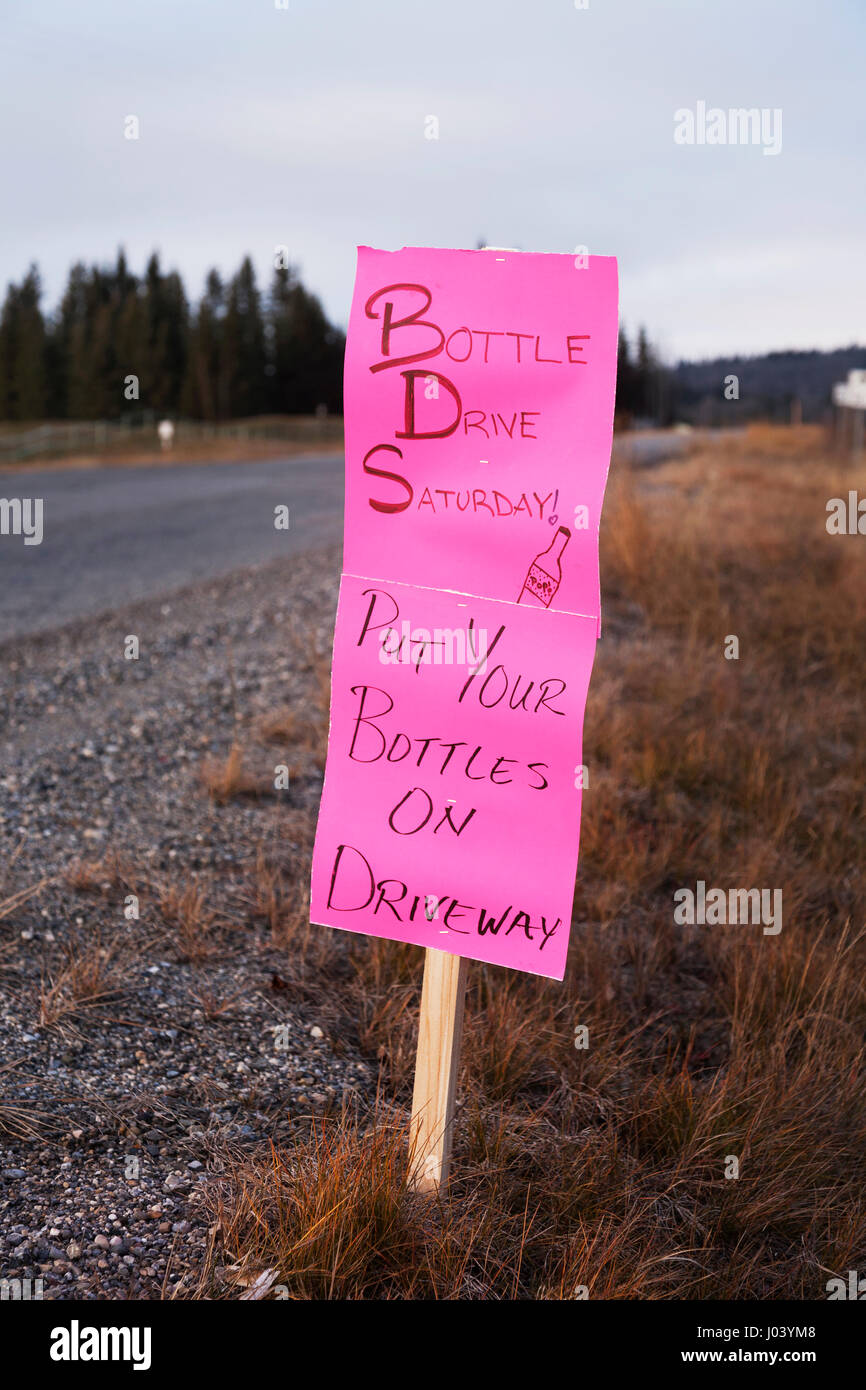 Bottle drive sign on side of road Stock Photo - Alamy