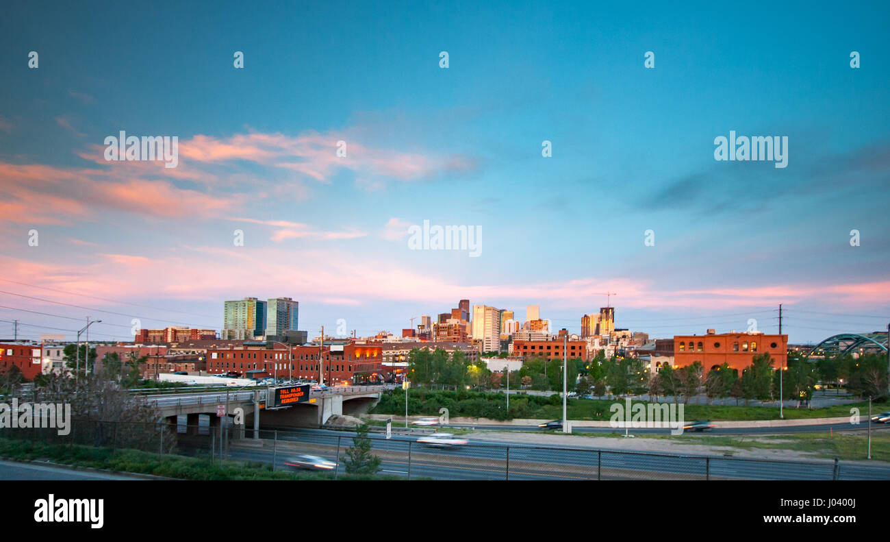 Denver, Colorado panoramic downtown skyline at sunset with colorful ...