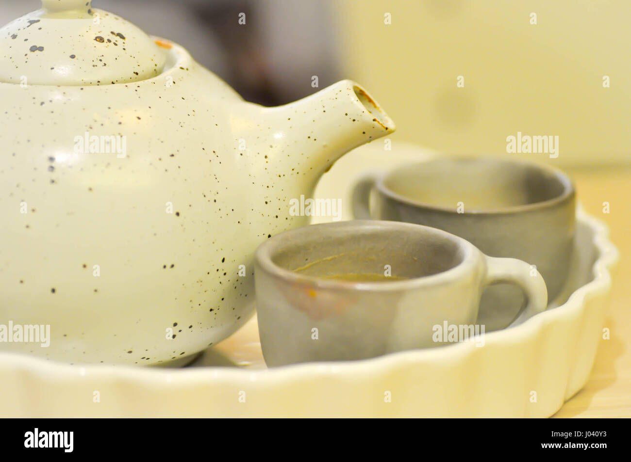 tea cup and tea pot on the table Stock Photo - Alamy