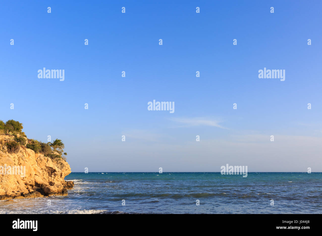 Mediterranean scene - sunny clifftop, sea and blue sky in summer Stock ...