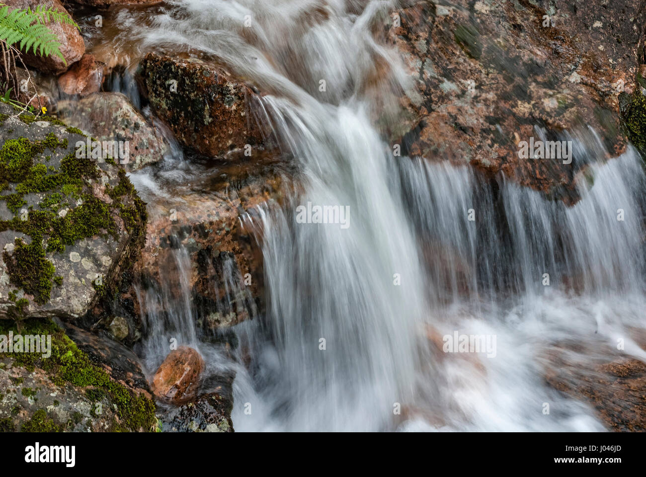 Water tumbling over rocks. Waterfall Stock Photo - Alamy