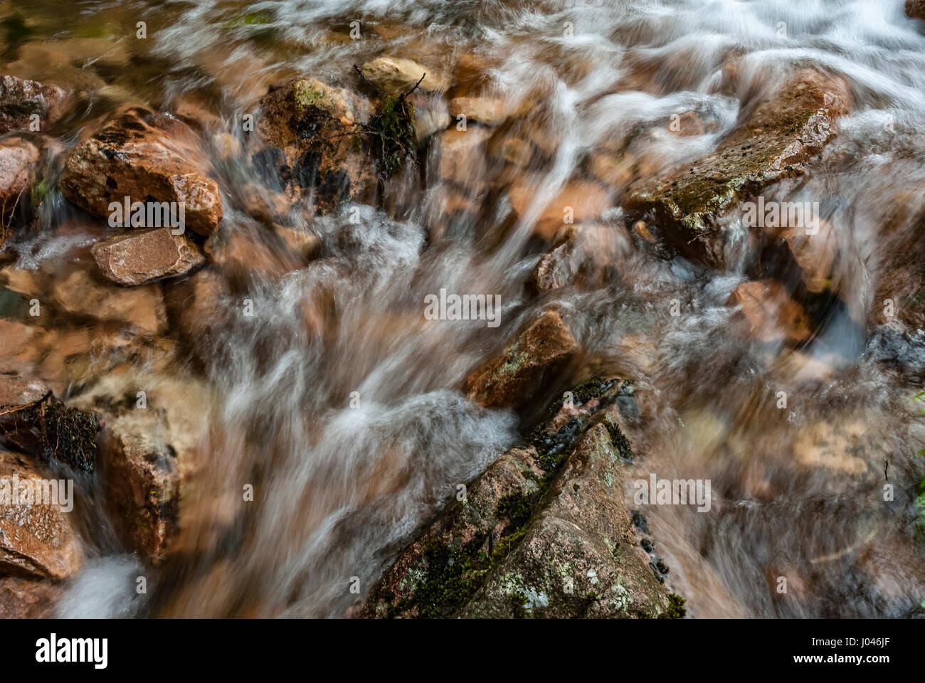 Water tumbling over rocks. Waterfall Stock Photo - Alamy