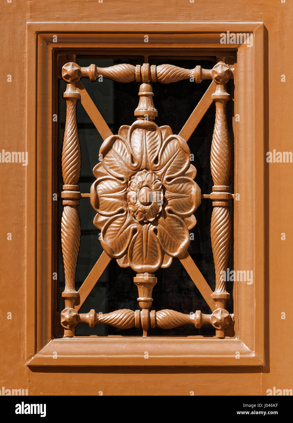 Carved wooden floral pattern decorative door window Stock Photo - Alamy