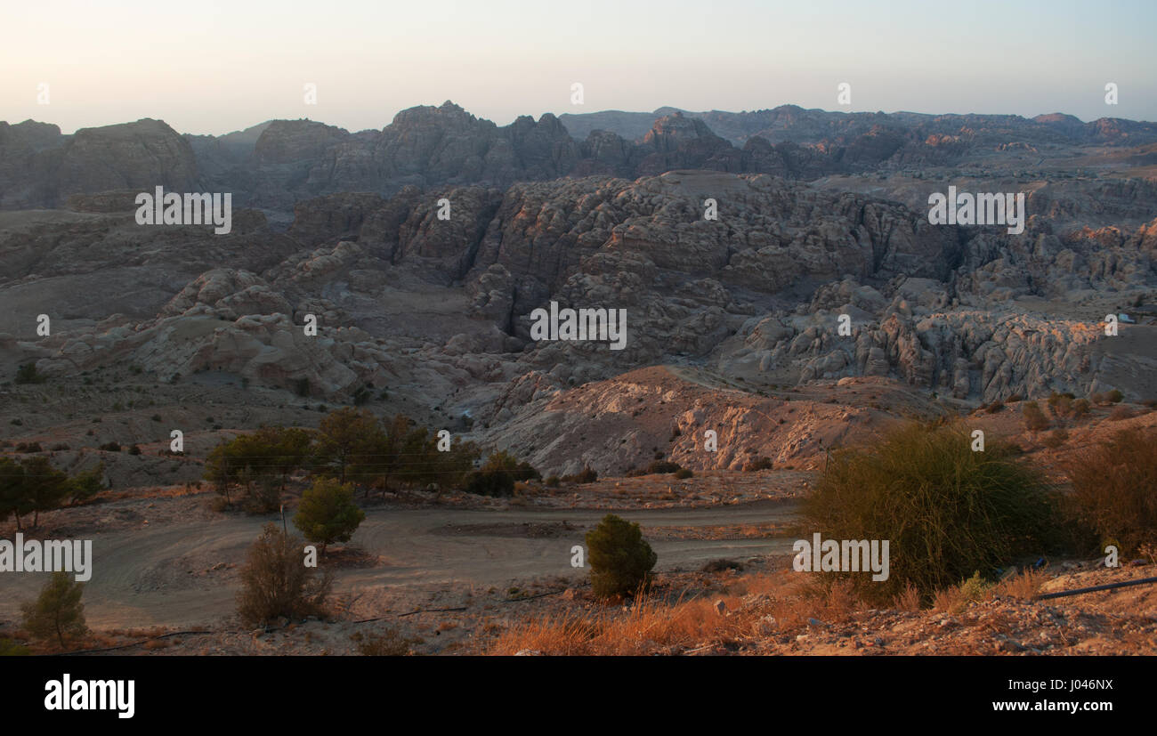 The jordanian landscape with mountains and vegetation seen at sunset ...