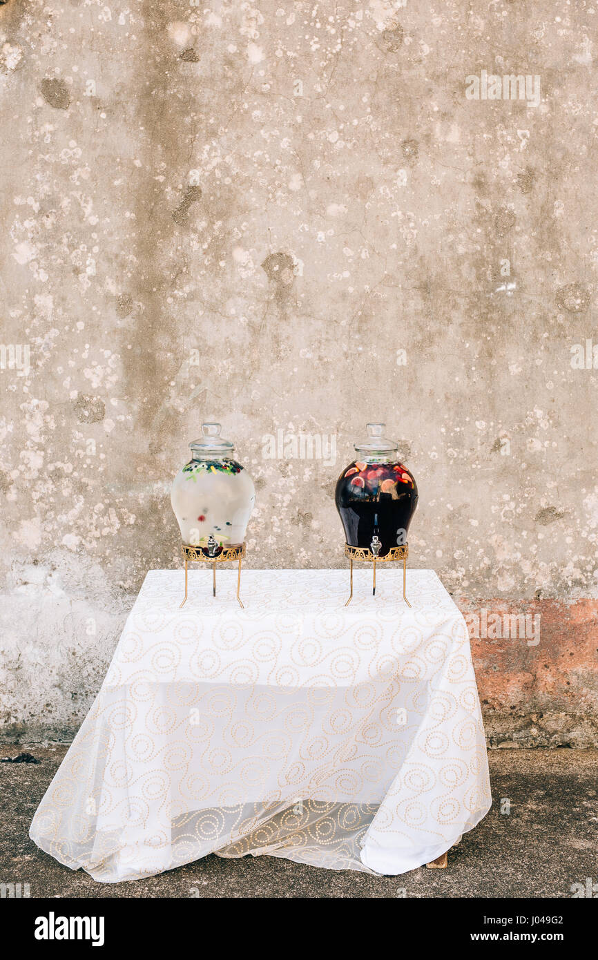 Lemonade in a glass barrel. Flasks for spilling drinks. Lemonade Stock ...