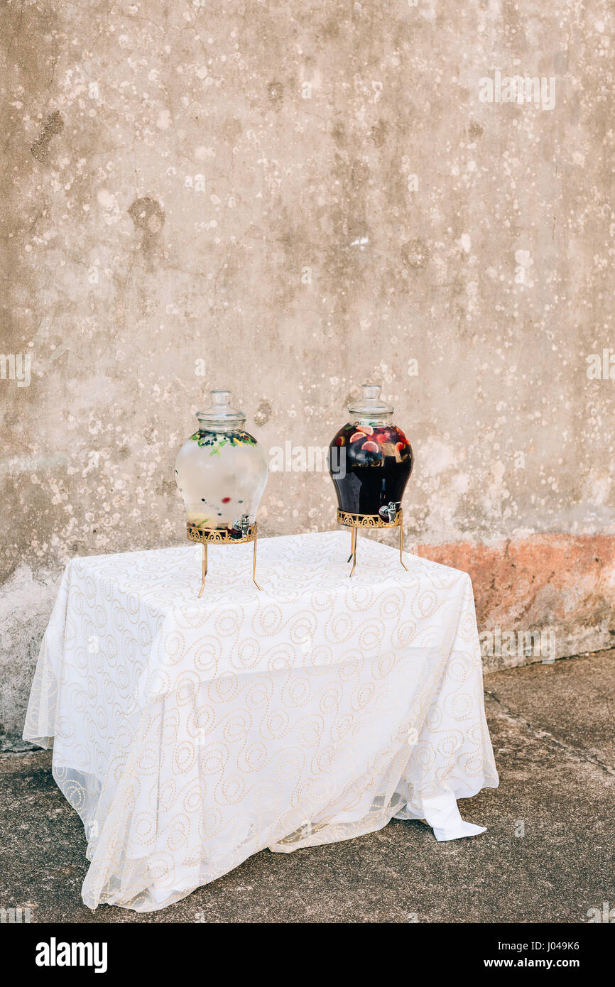 Lemonade in a glass barrel. Flasks for spilling drinks. Lemonade Stock ...