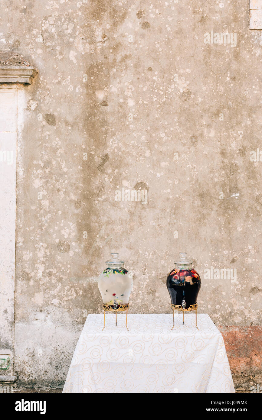 Lemonade in a glass barrel. Flasks for spilling drinks. Lemonade Stock ...