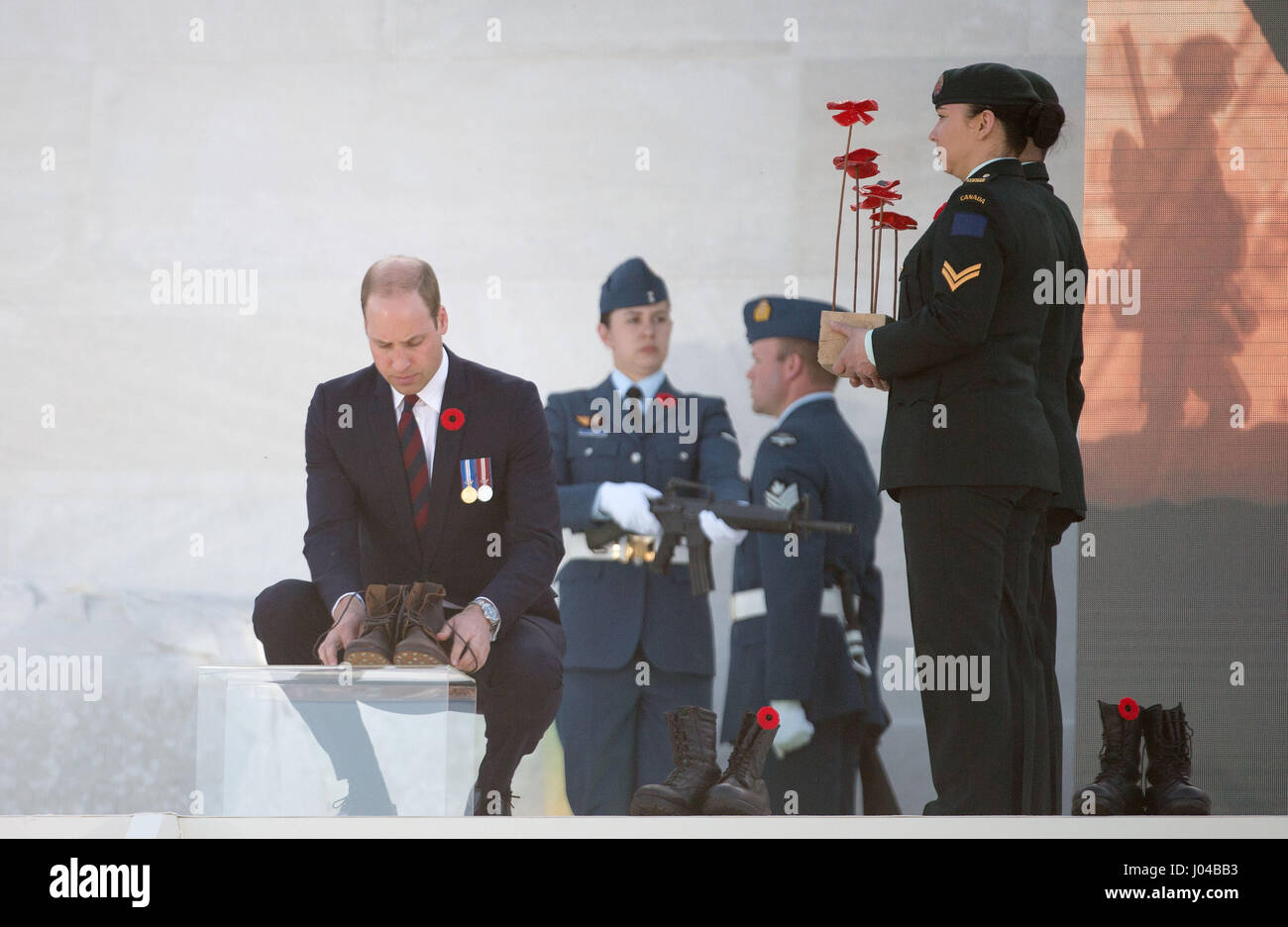 The Duke of Cambridge lays boots and a poppies of remembrance at Vimy ...
