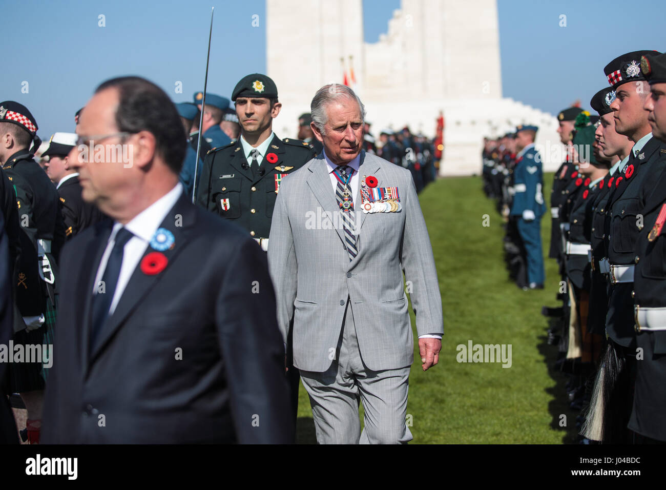 The Prince of Wales reviews the guard at the commemorative ceremony at ...