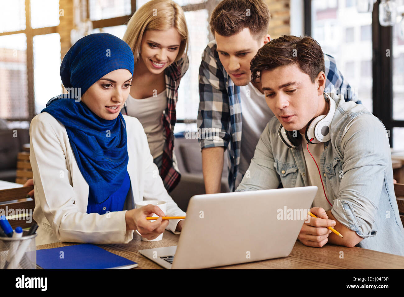Involved international students learning together Stock Photo - Alamy