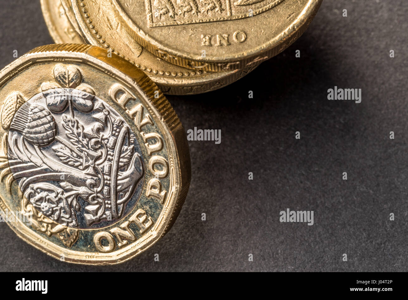 New british one sterling pound coin on dark background Stock Photo - Alamy