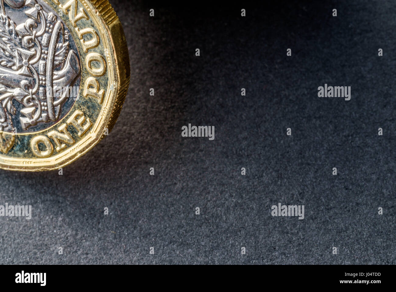 New british one sterling pound coin on dark background Stock Photo - Alamy