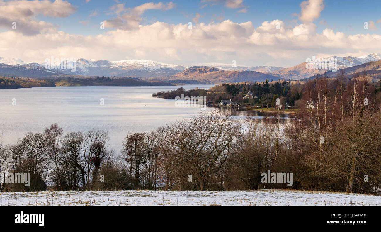 Winter snow lies on the fields and mountains around Windermere in ...