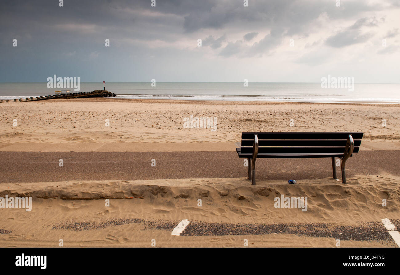 A bench looks out over the English Channel and Bournemouth's sandy ...