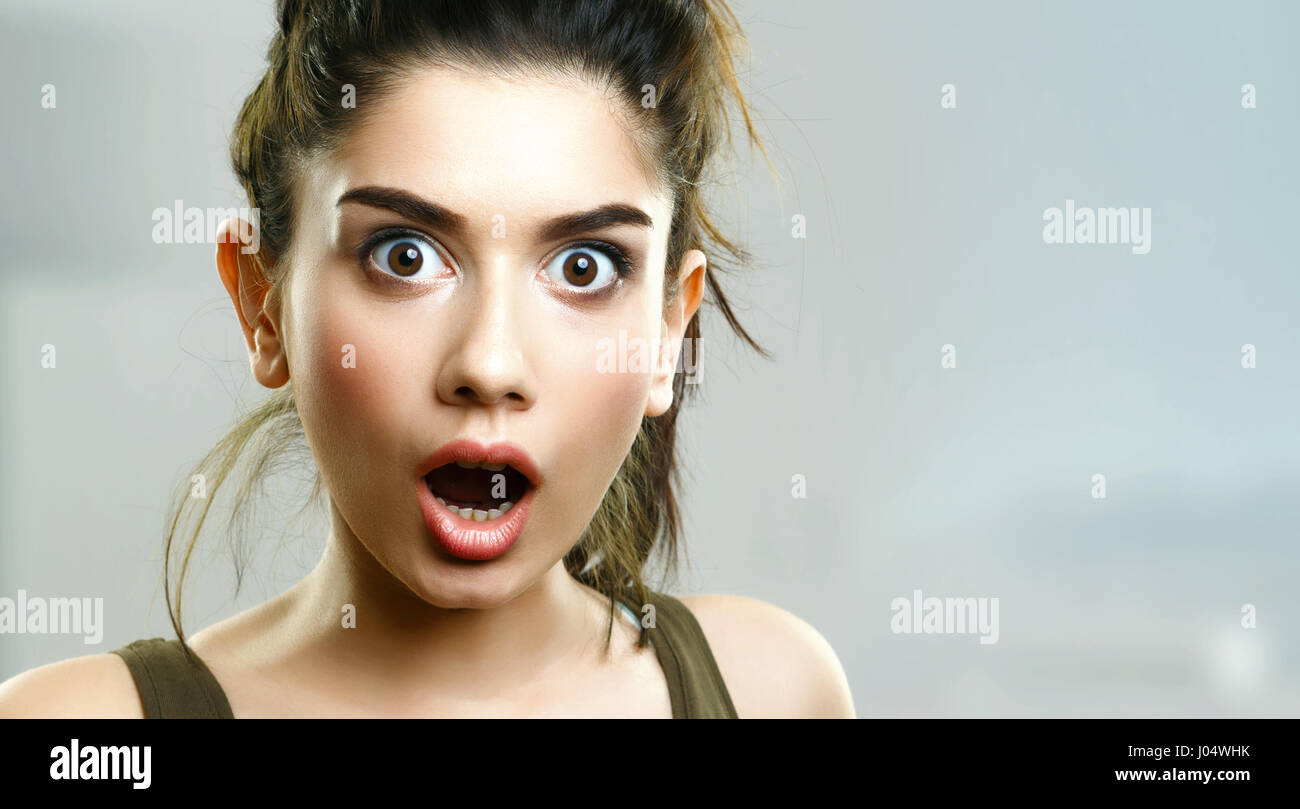 Face of surprised shocked young girl Stock Photo - Alamy