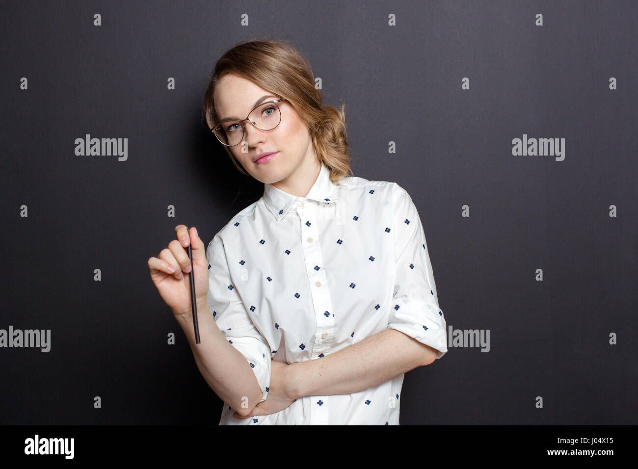 Serious female model hi-res stock photography and images - Alamy