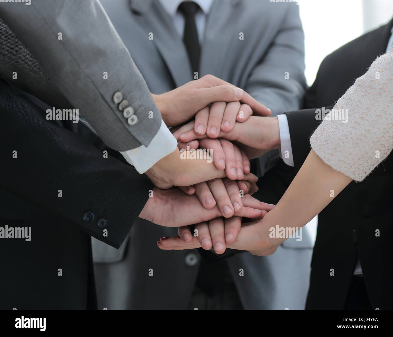 Business people join hand together during their meeting Stock Photo - Alamy