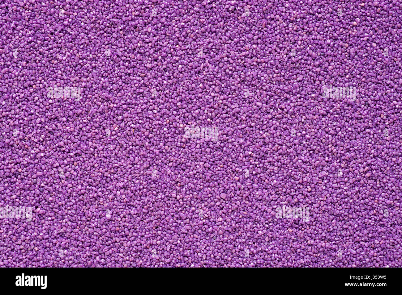 Purple sand extremal close up. Texture and background Stock Photo - Alamy