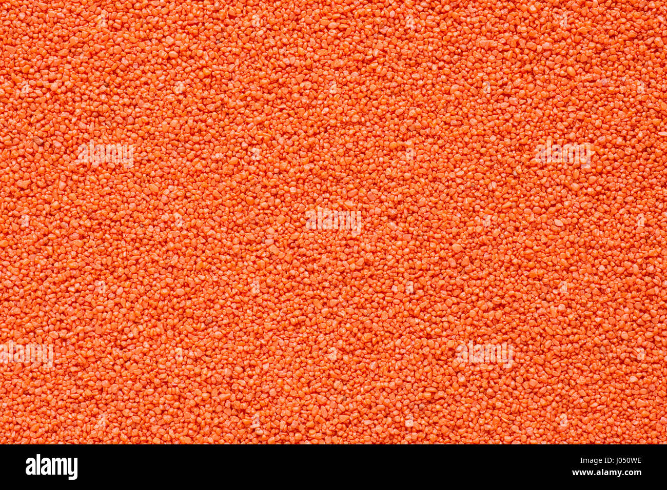 Orange sand extremal close up. Background and texture Stock Photo - Alamy