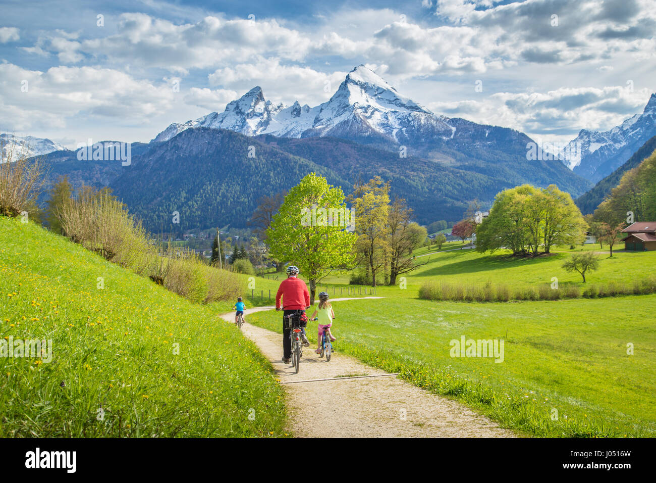 Beautiful view of a group of bikers cycling on a scenic trail in ...