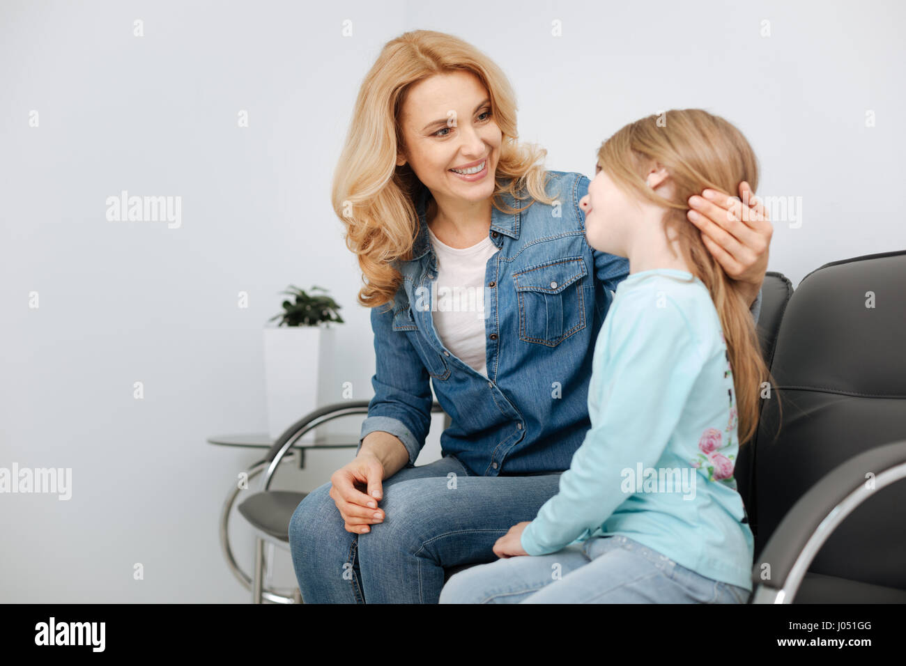 Stunning young mother comforting her child Stock Photo - Alamy