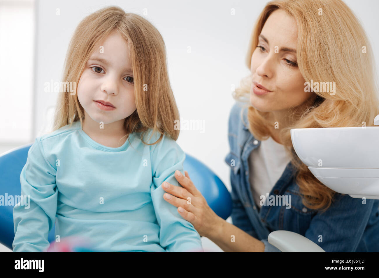 Gentle mother comforting her scared child Stock Photo - Alamy