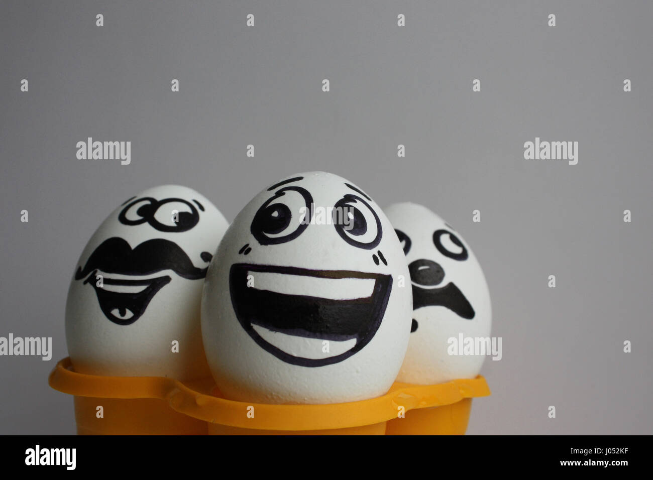 Eggs with a cute face. Photo for your design. three eggs. Concept ...