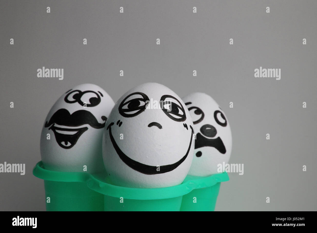 Eggs with a cute face. Photo for your design. three eggs. Concept ...