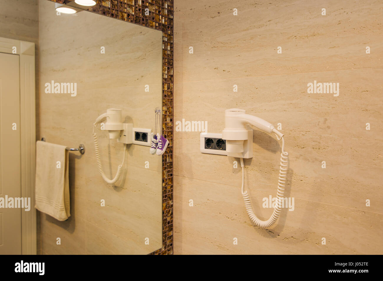Hair dryer in the bathroom. The interior of the bathroom at the hotel ...