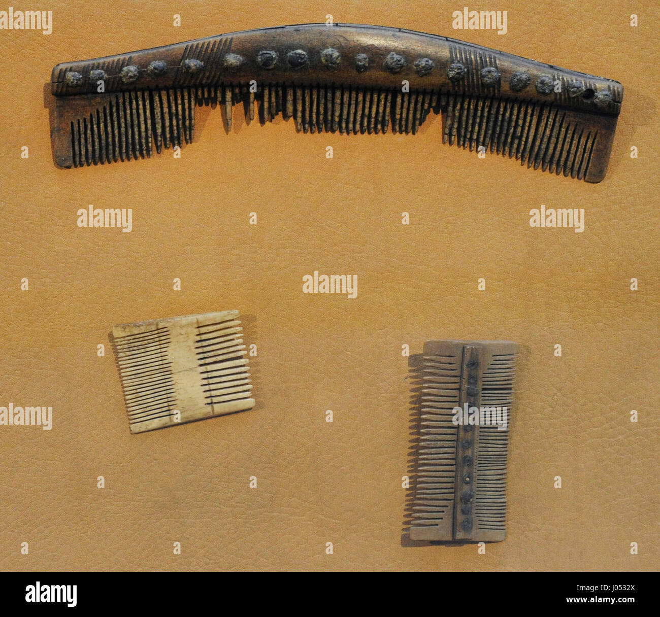 Scandinavia. Combs made from antler. The upper comb from c. 1100, the ...