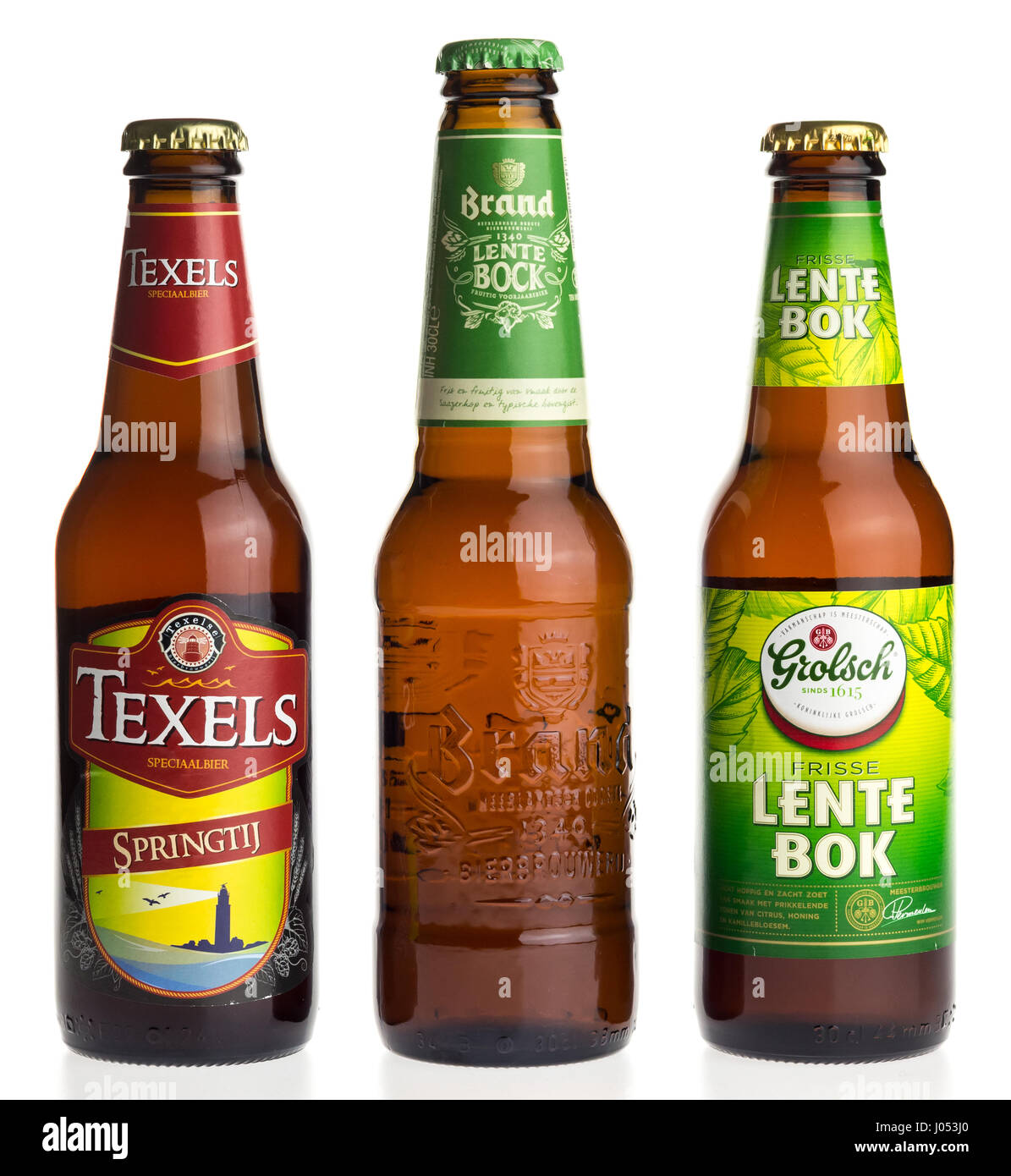 Bottles of dutch craft spring beers isolated on a white background ...