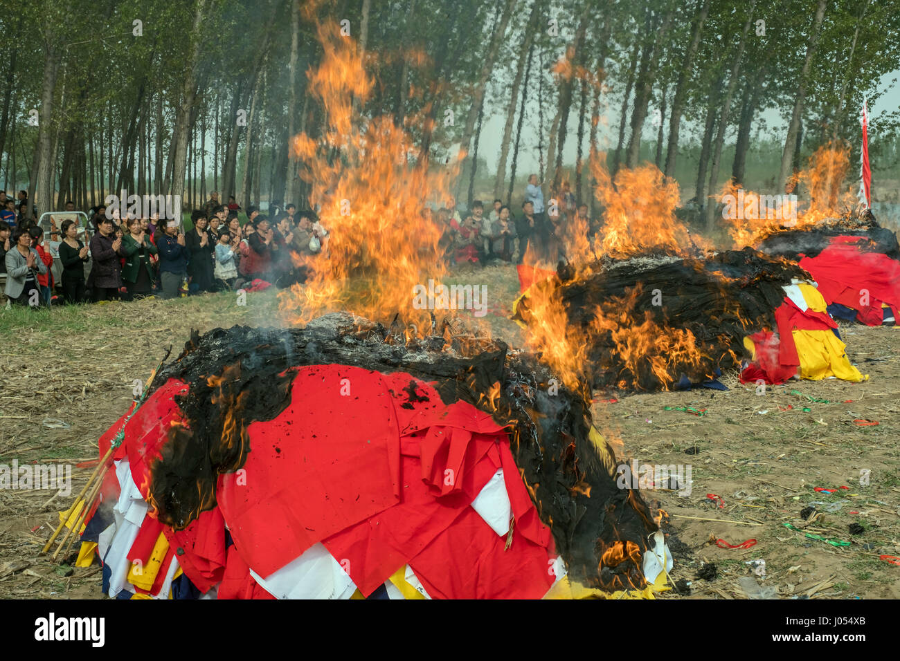 Local villagers burn up all the incense while attending an annual ...